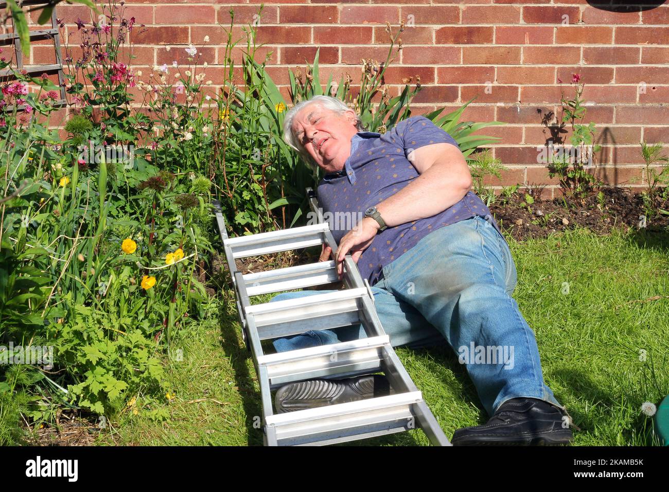 Man unconscious accident fall hi-res stock photography and images - Alamy
