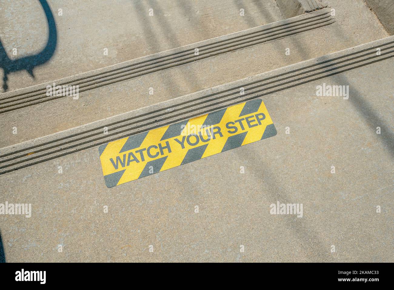 View of watch your step of a two step stairs from above in Tucson ...