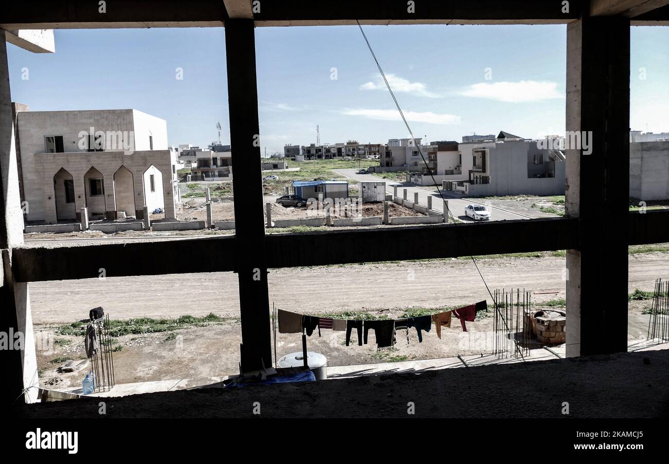 An occupied building by yazidi people in a makeshift camp near Sinjar ...