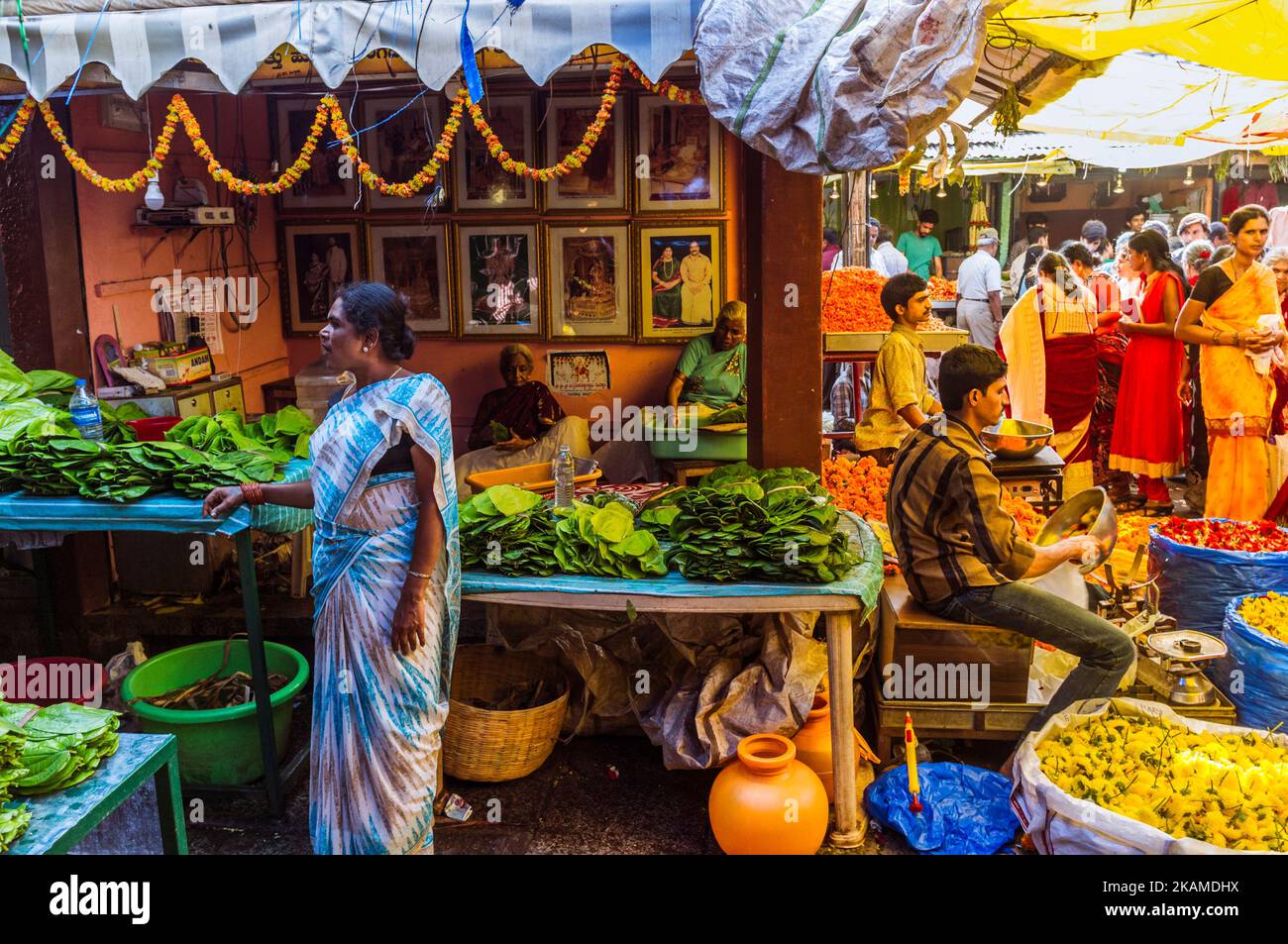 Mysore, Karnataka, India : A woman stands next to a stall at Devaraja ...