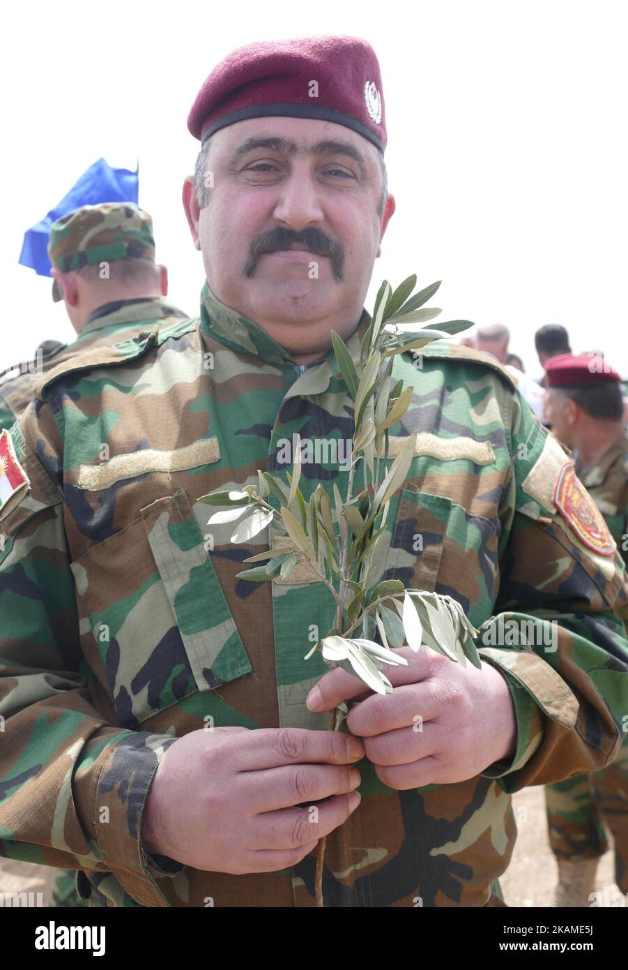 Peshmerga join a Peace Solidarity March on Palm Sunday with the Chaldean Christian church ...