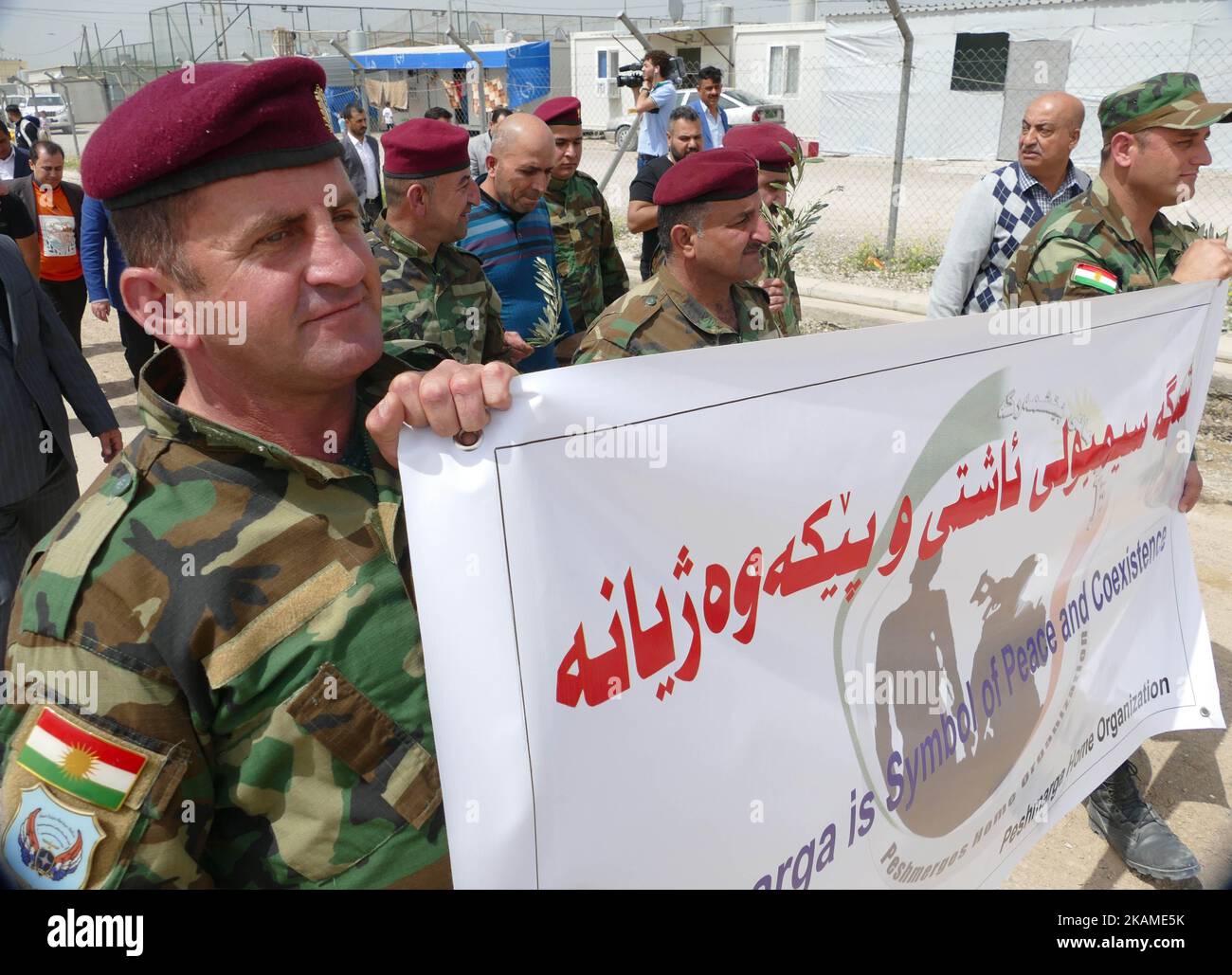 Peshmerga join a Peace Solidarity March on Palm Sunday with the Chaldean Christian church ...