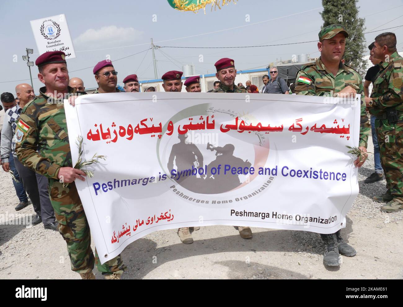 Peshmerga join a Peace Solidarity March on Palm Sunday with the Chaldean Christian church ...