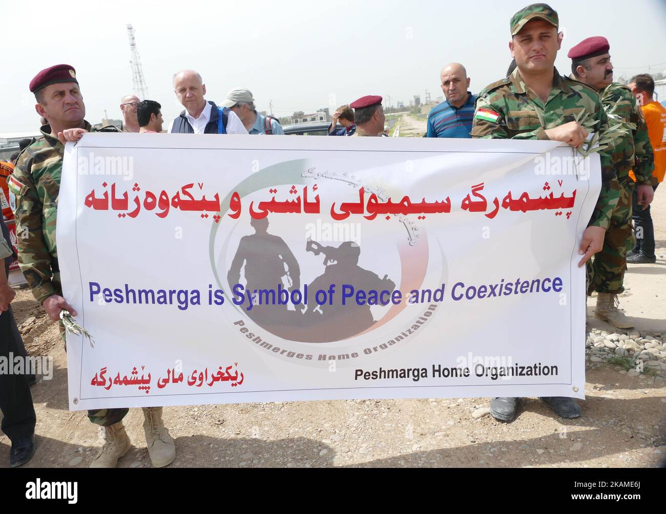 Peshmerga join a Peace Solidarity March on Palm Sunday with the Chaldean Christian church ...