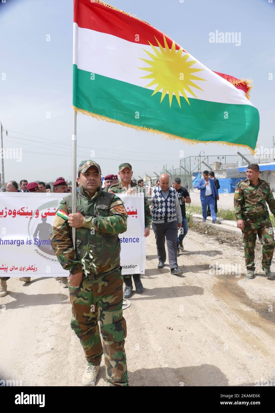 Peshmerga join a Peace Solidarity March on Palm Sunday with the Chaldean Christian church ...