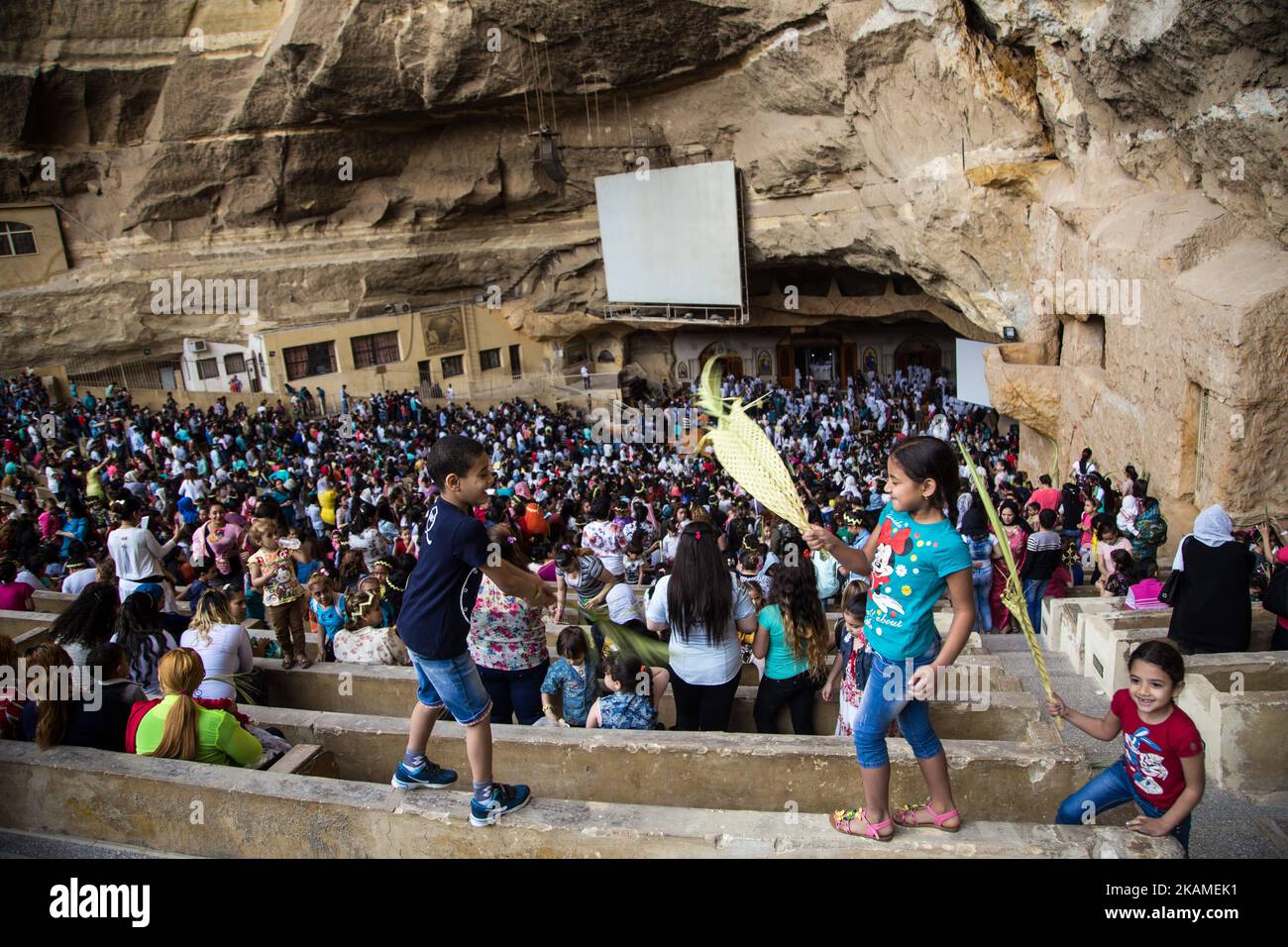 Christians pray during Palm Sunday mass inside the Cave Cathedral or St ...