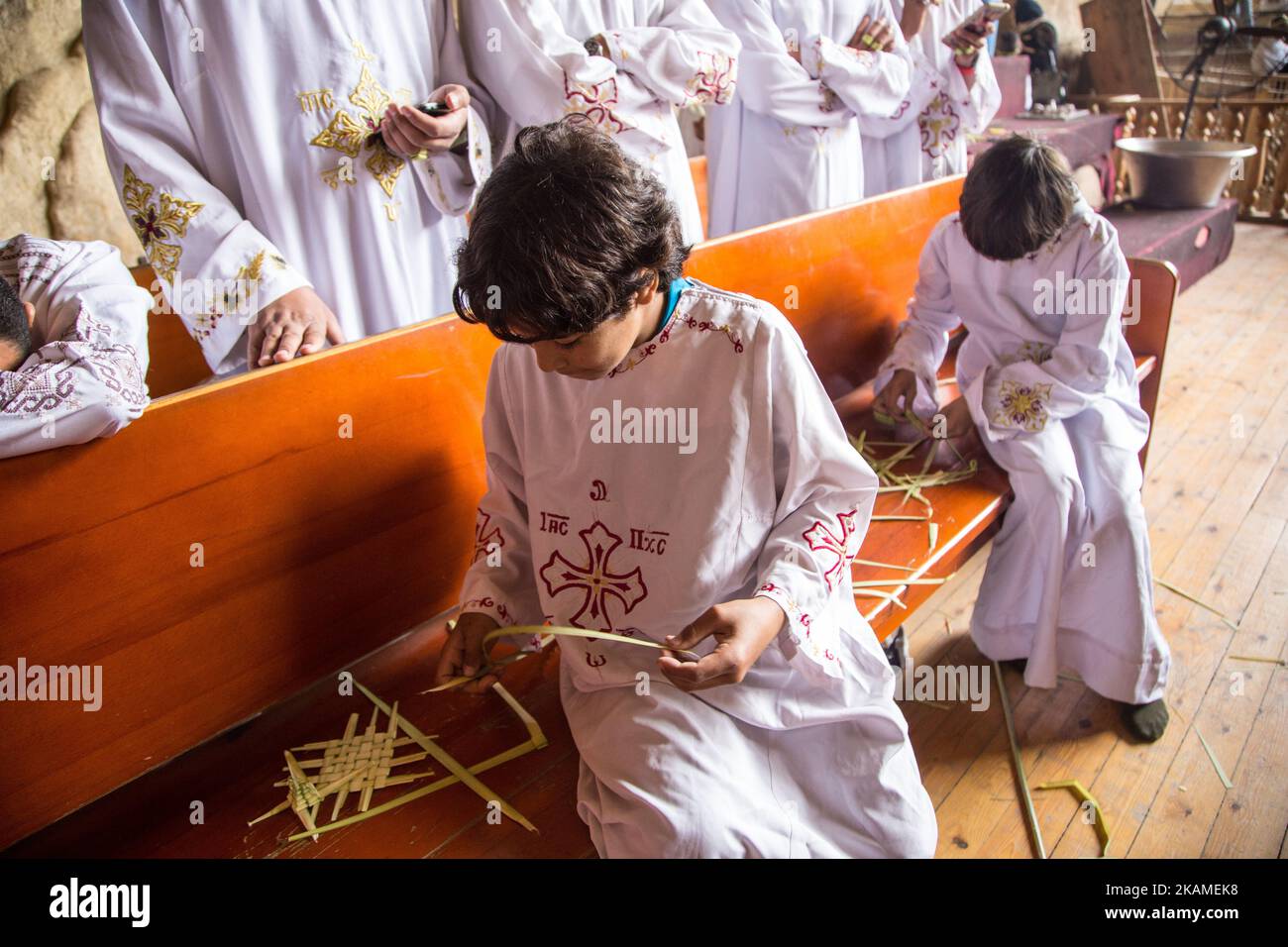 Christians pray during Palm Sunday mass inside the Cave Cathedral or St ...