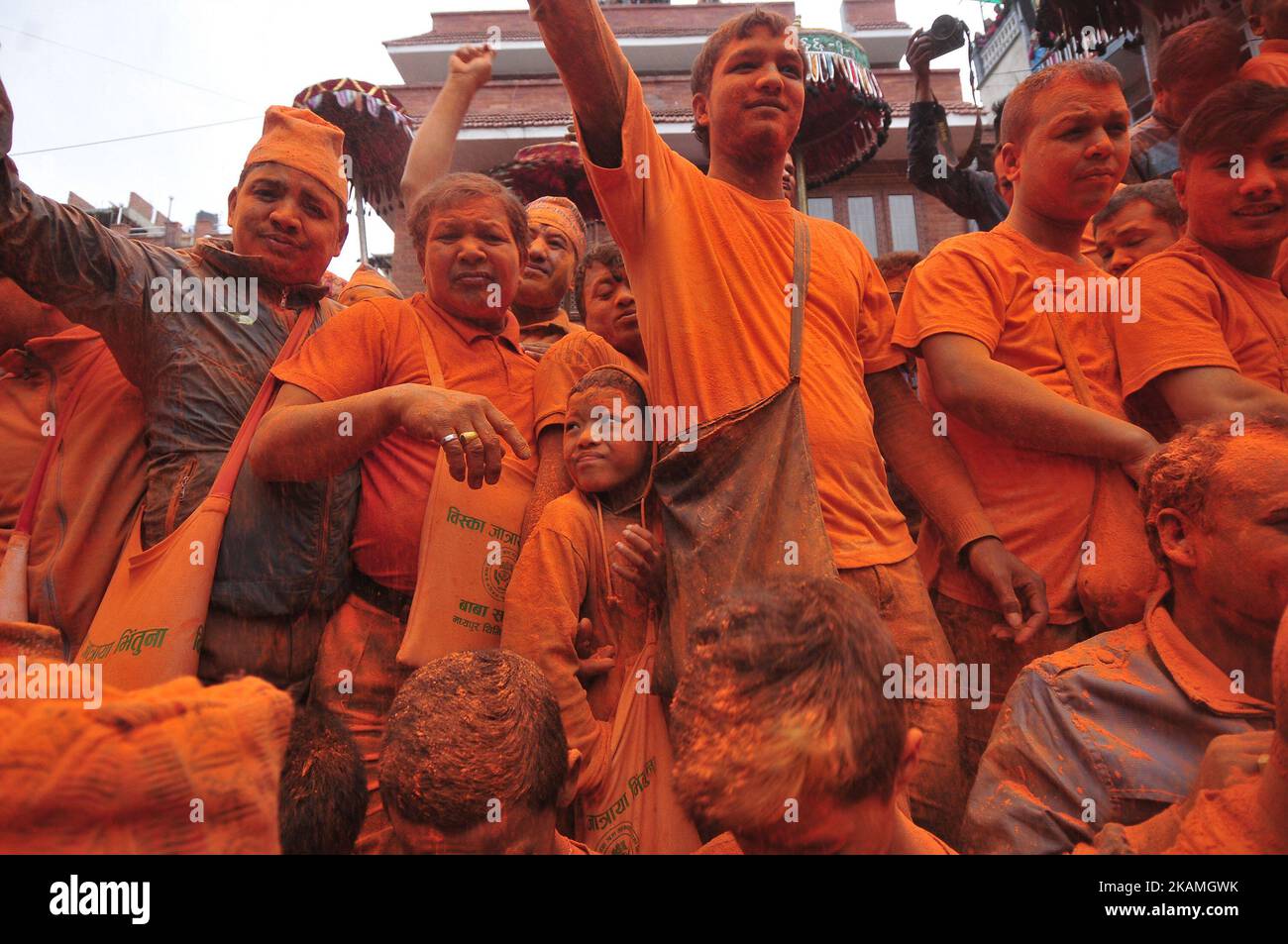 Devotee spreading vermillion powder towards his friends during the ...