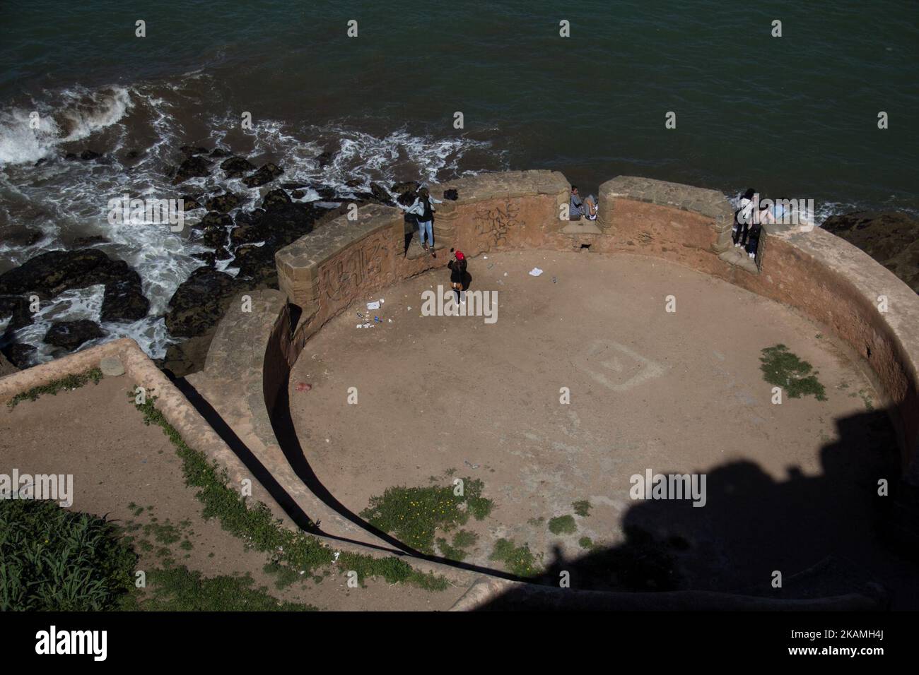 Visitors takes pictures at the old fort of Rabat on April 17, 2017 ...