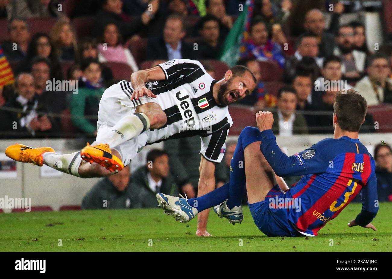 Giorgio Chiellini and Gerard Pique during UEFA Champions League match ...