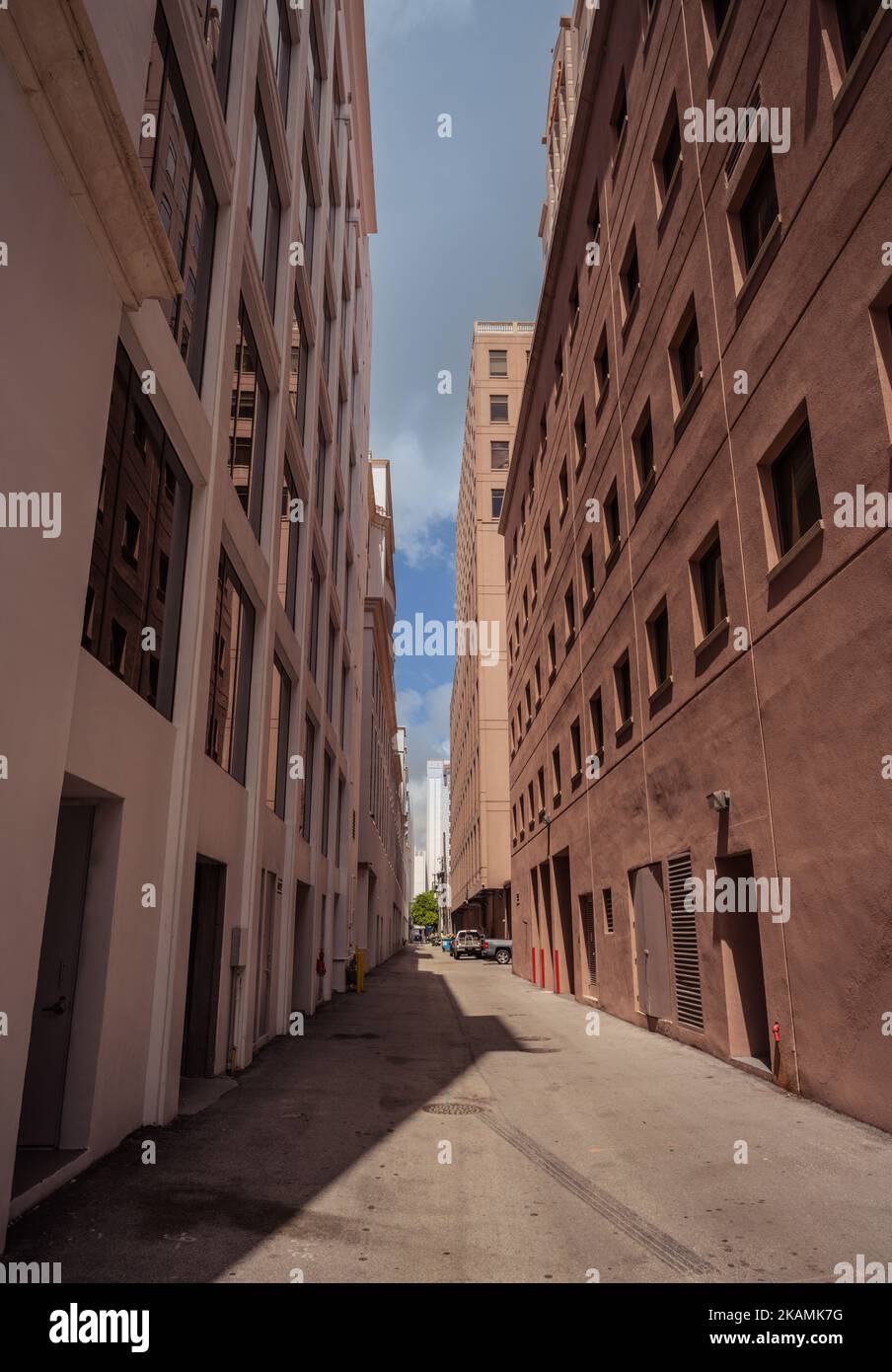 A walkway between two tall new parallel buildings Stock Photo - Alamy