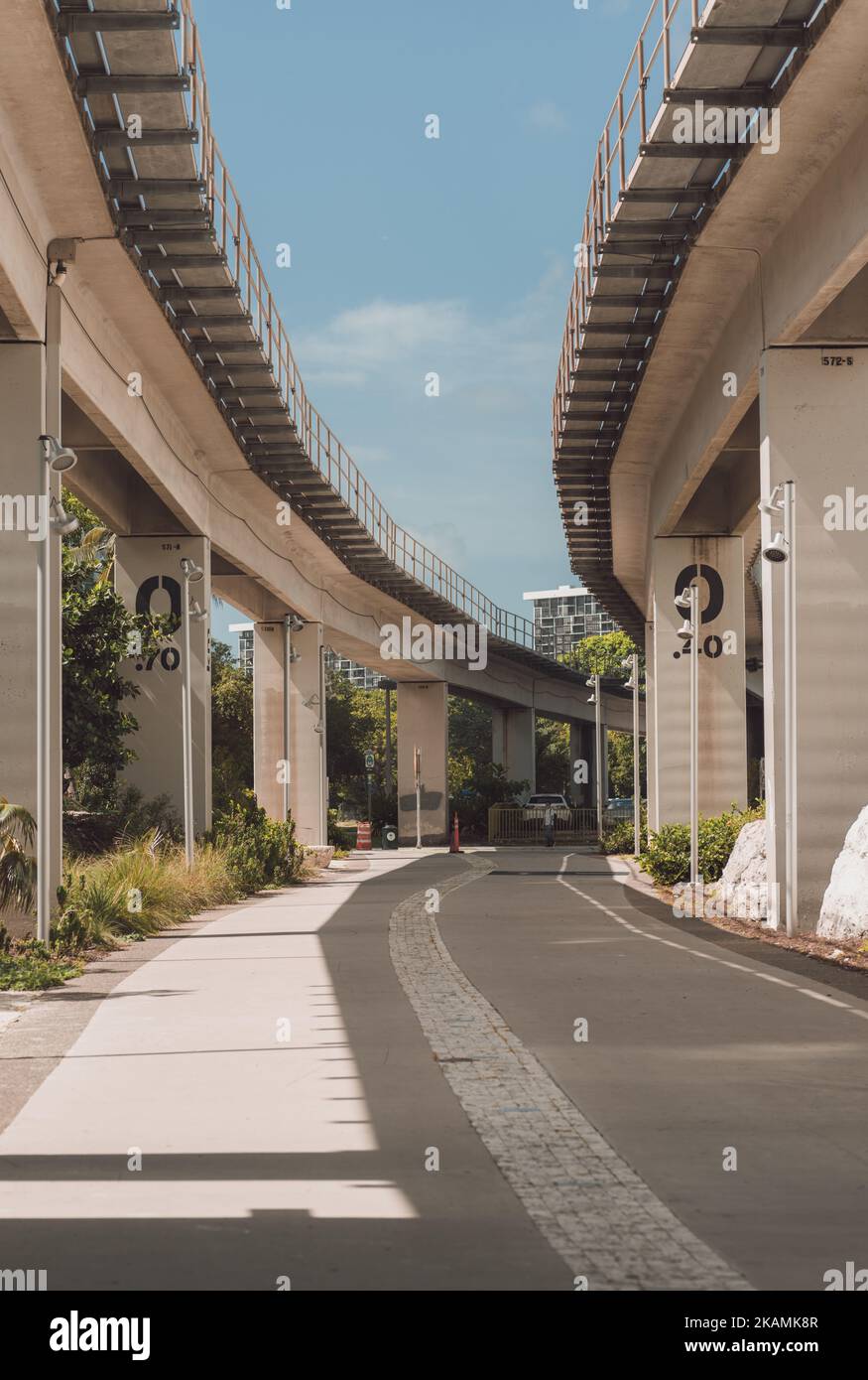 A large walkway between two tall parallel buildings Stock Photo - Alamy