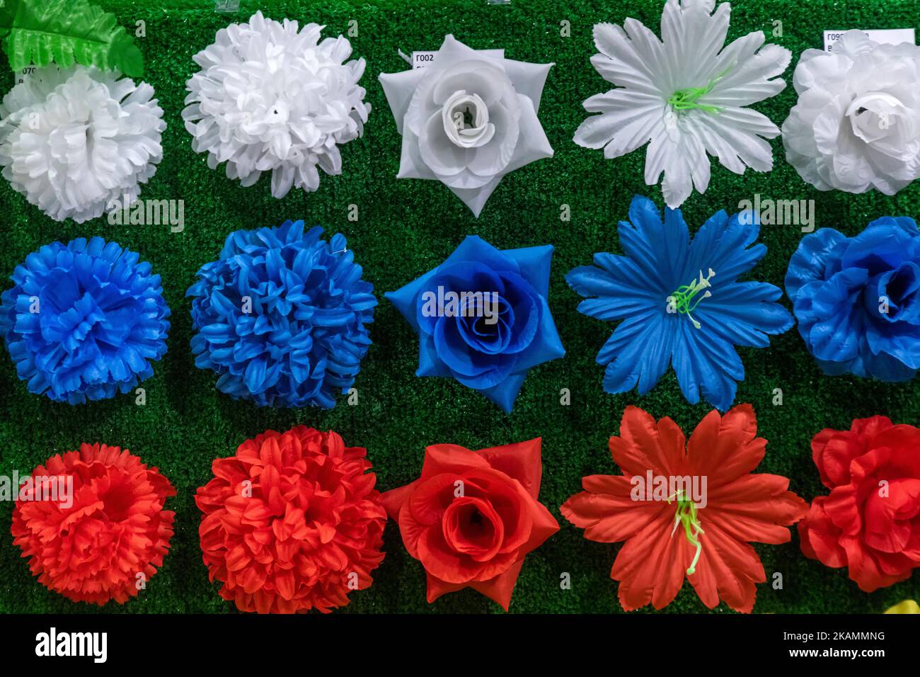 Plastic flowers for decoration of burials in a colors of the Russian ...