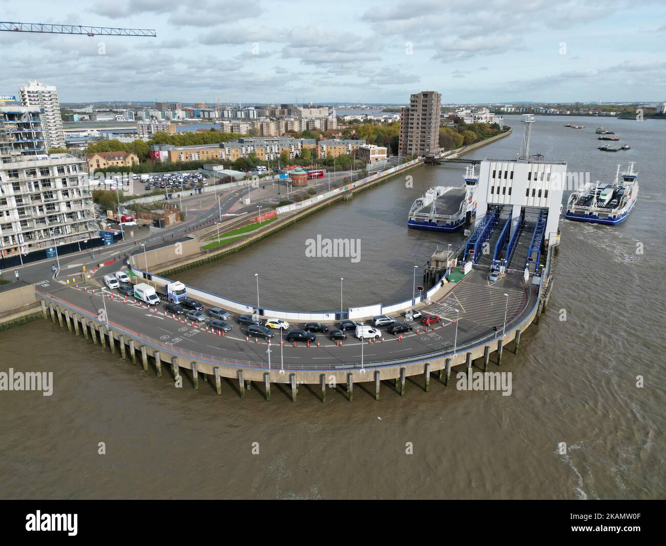 Woolwich ferry crossing River Thames London UK drone aerial view Stock ...