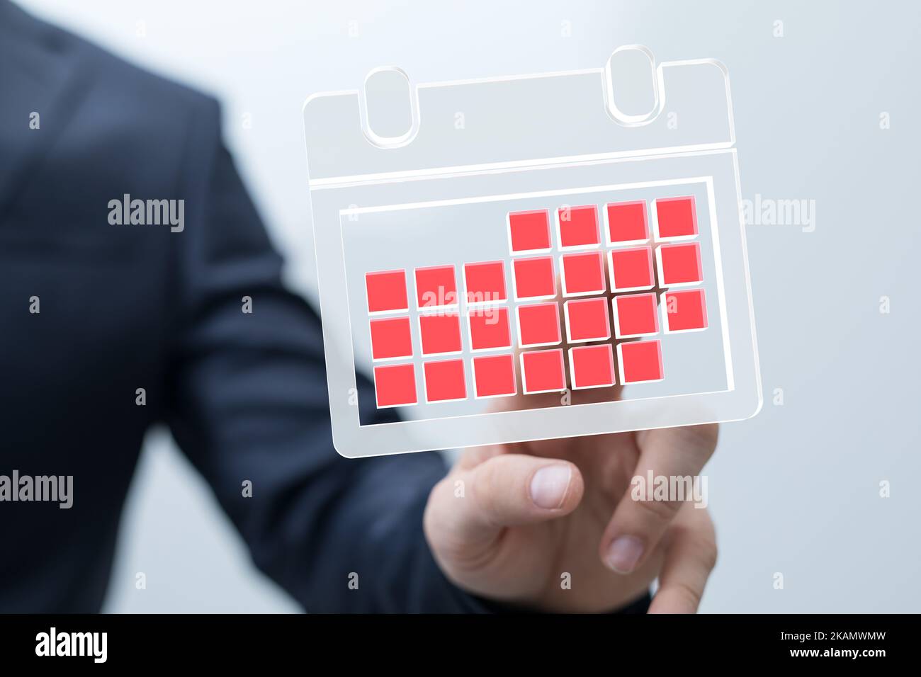 Two fingers pointing at a 3D-rendered calendar floating in the air ...