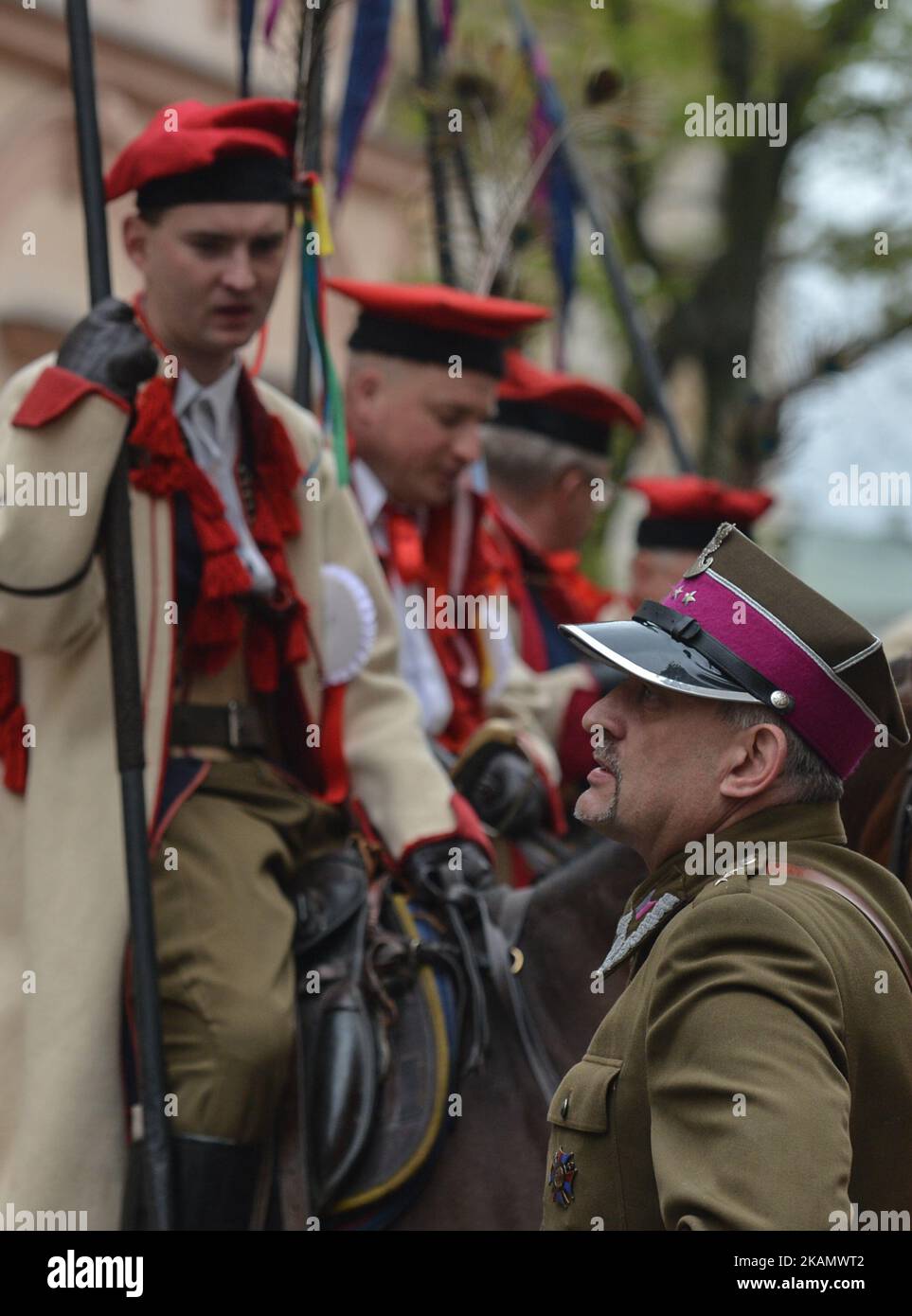People wearing Polish Army Military Uniforms from diferent centuries ...