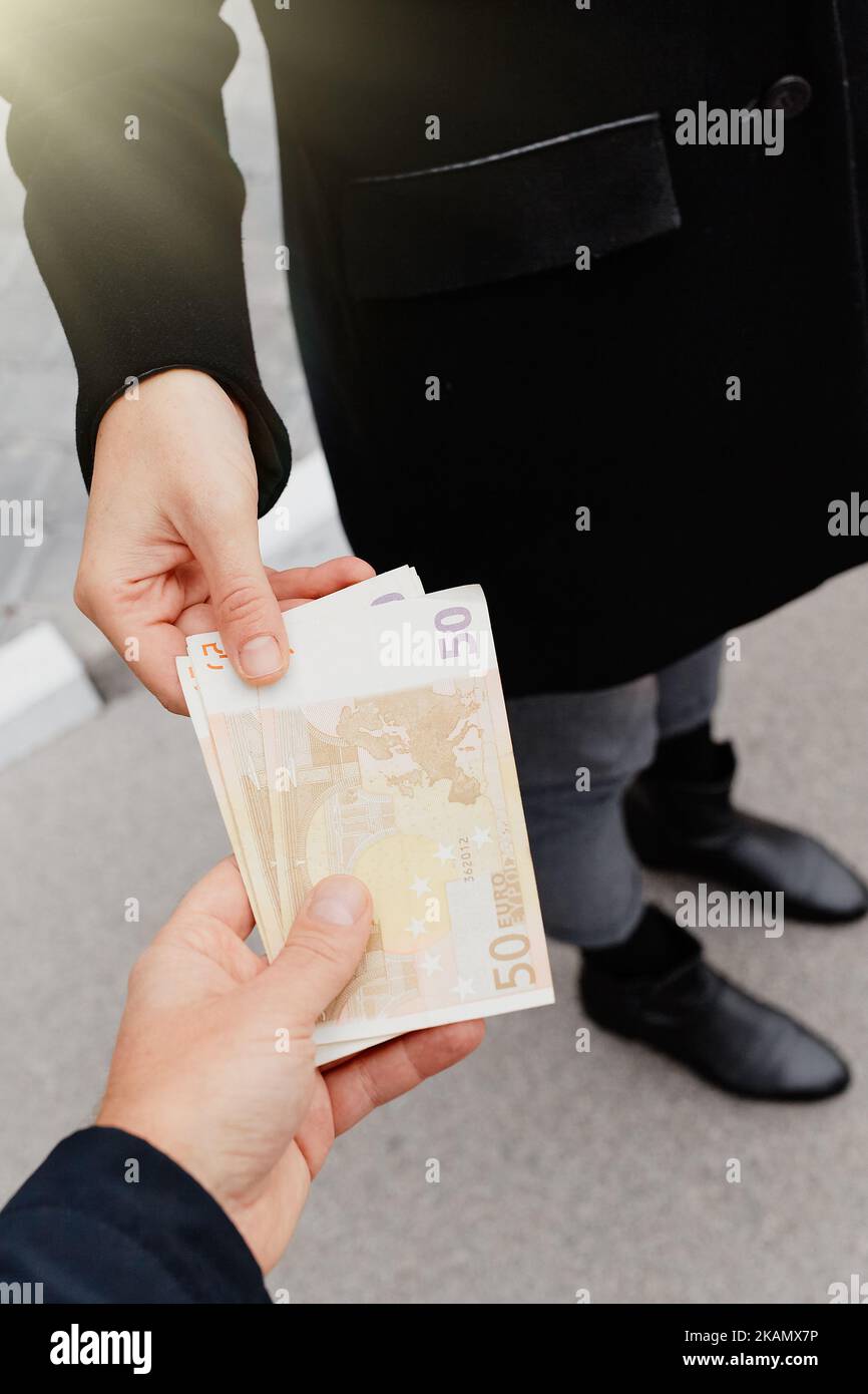 Man giving money hi-res stock photography and images - Alamy