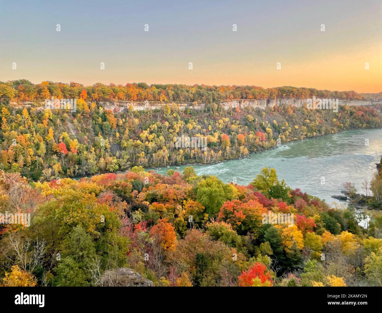 A beautiful shot of Echo lake and colorful fall foliage in Franconia ...