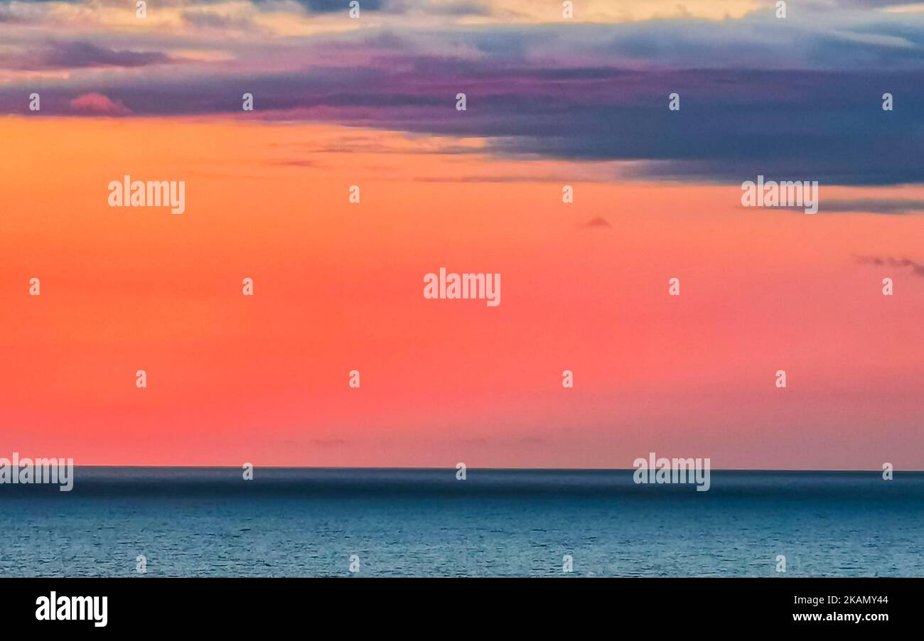 Beautiful stunning colorful and golden sunset in yellow orange red on ...