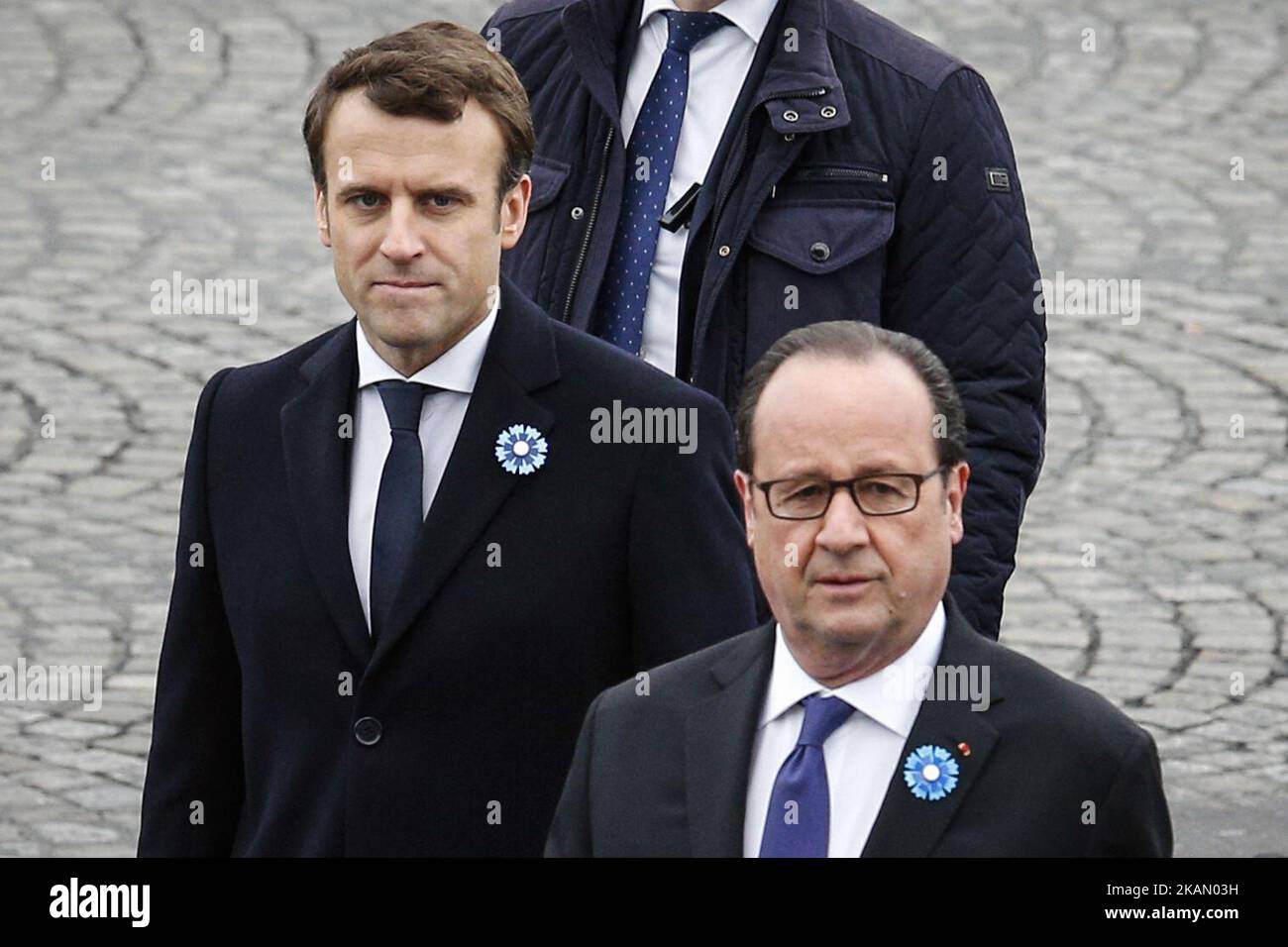 French president-elect Emmanuel Macron (L) and outgoing French ...