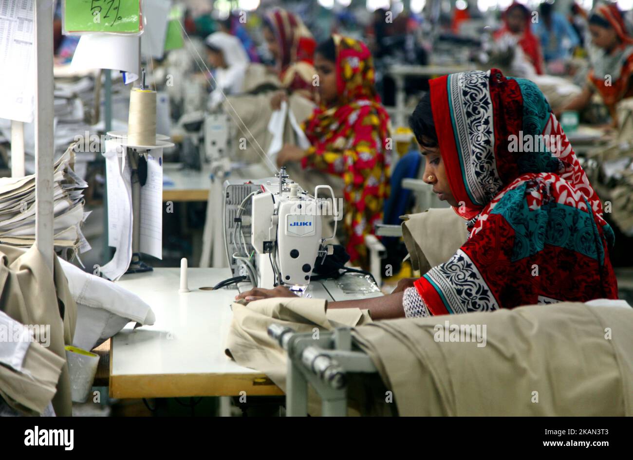 Garments worker working inside a factory in Gazipur in Bangladesh, on ...