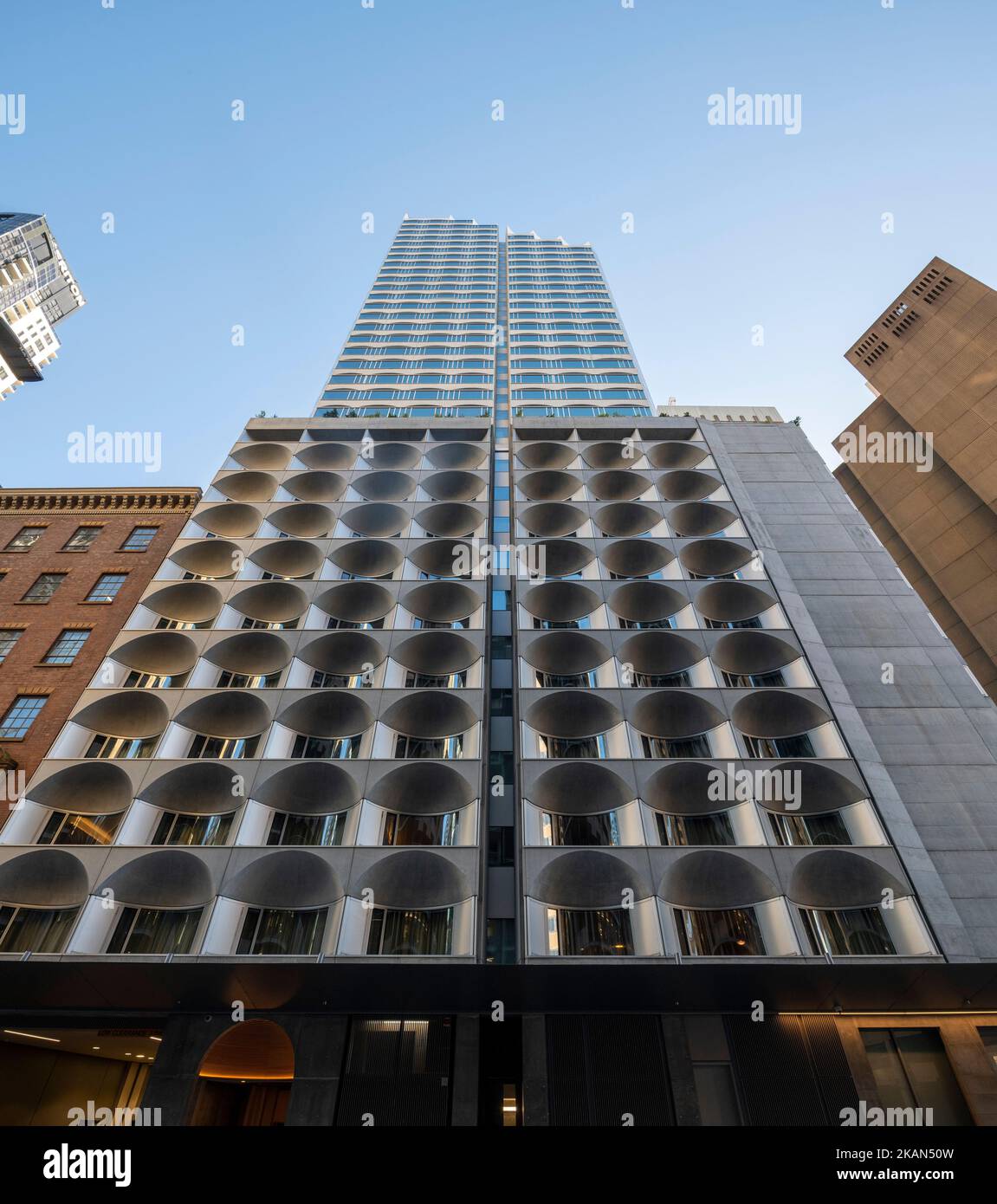 View up Bathurst Street elevation of building through lower hotel ...