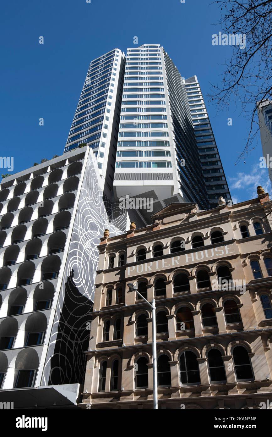 Upward view from street level of heritage building, hotel levels and ...