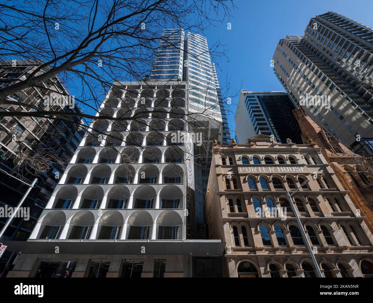Upward view from street level of heritage building, hotel levels and ...