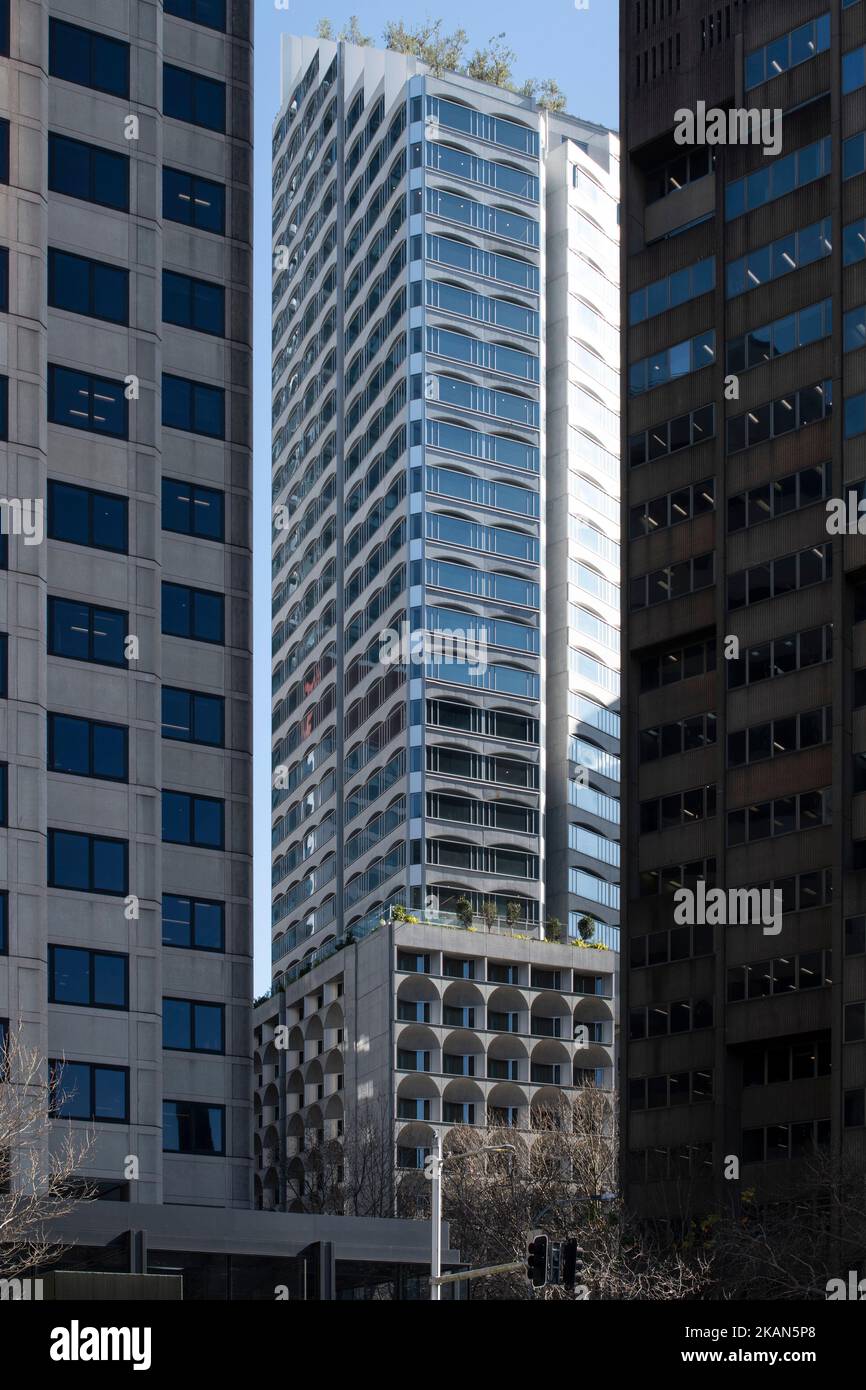 View of building sandwiched between neighbouring buildings. The Castle ...