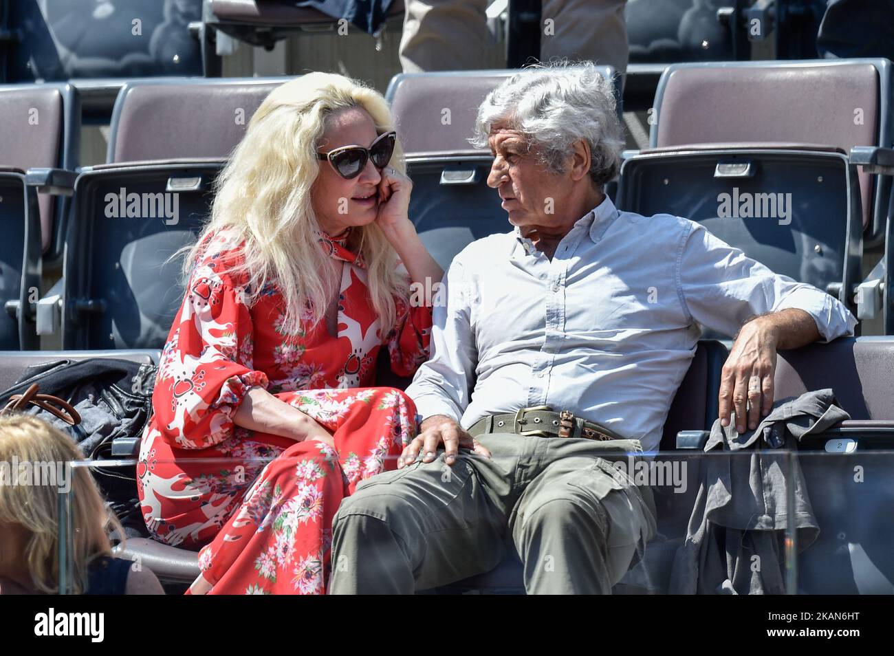 AC Milan legend Gianni Rivera seats on the stands with his wife during ...