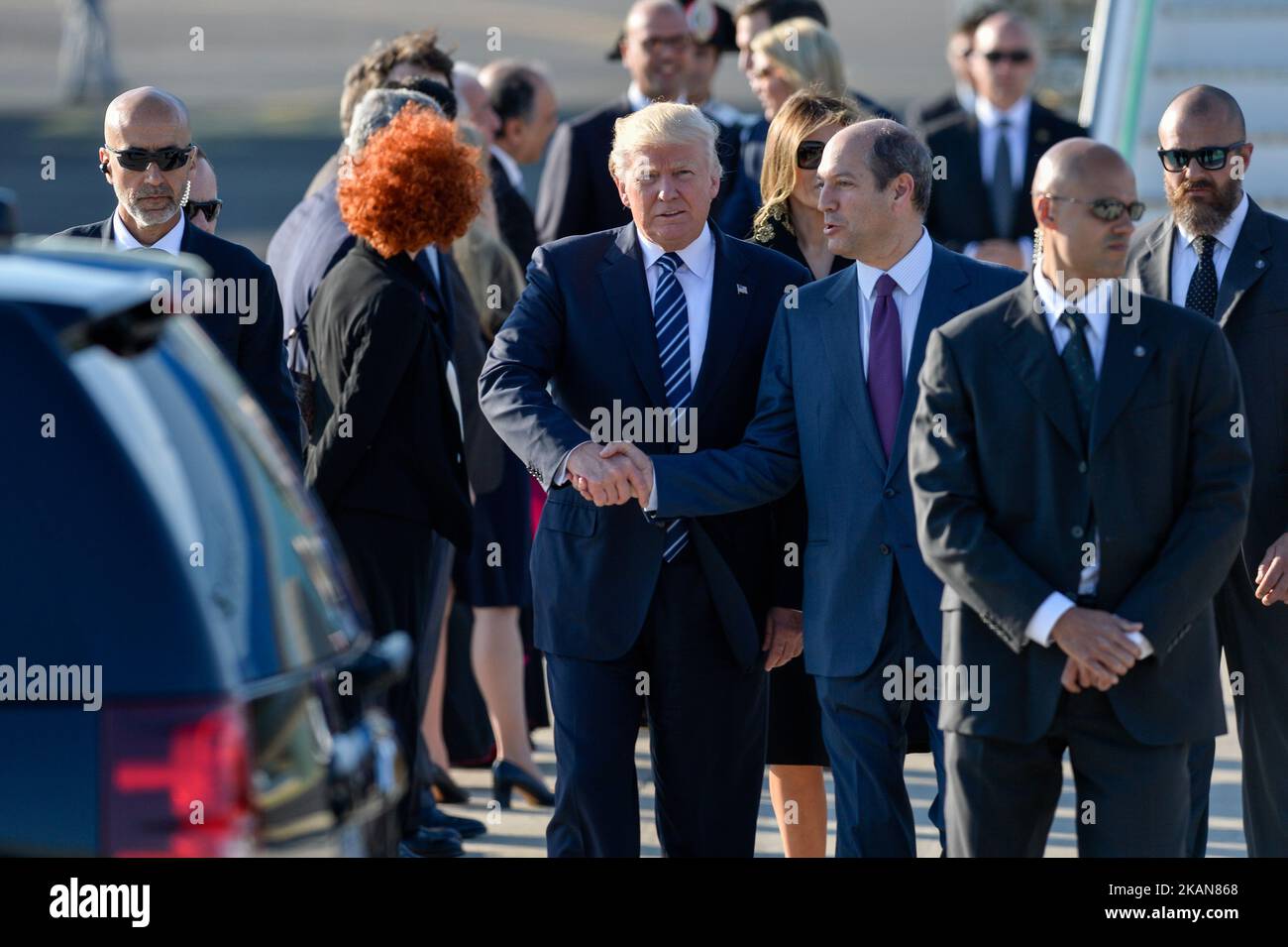 US President Donald Trump and his wife, First Lady Melania Trump, wave ...