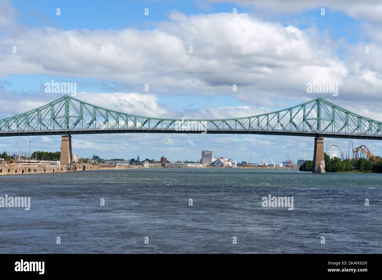 Jacques Cartier bridge crossing Saint Lawrence river in Montreal. In ...