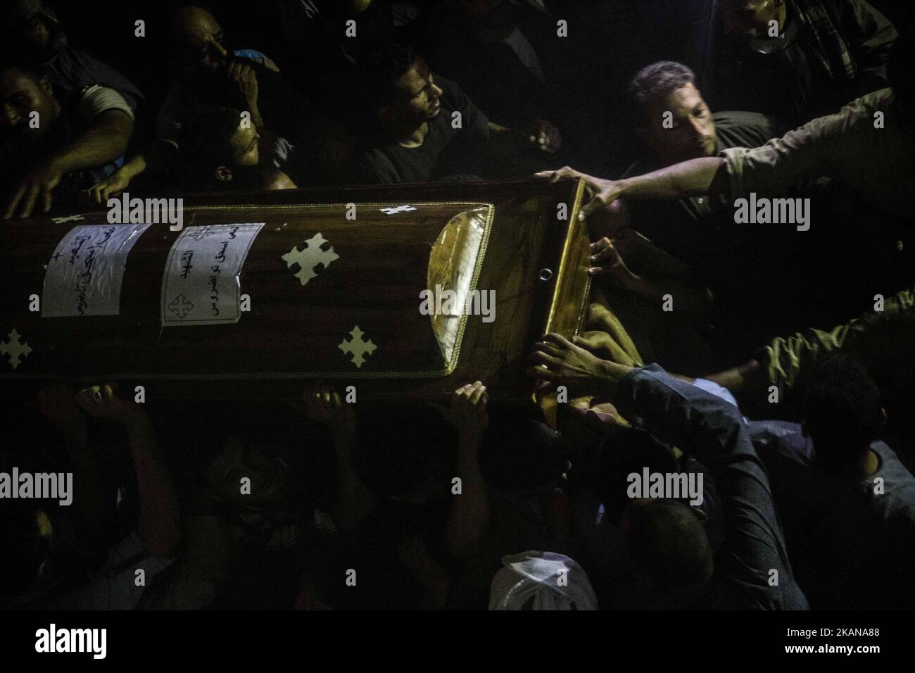 Funeral service of Christians who were killed during a bus attack, at ...