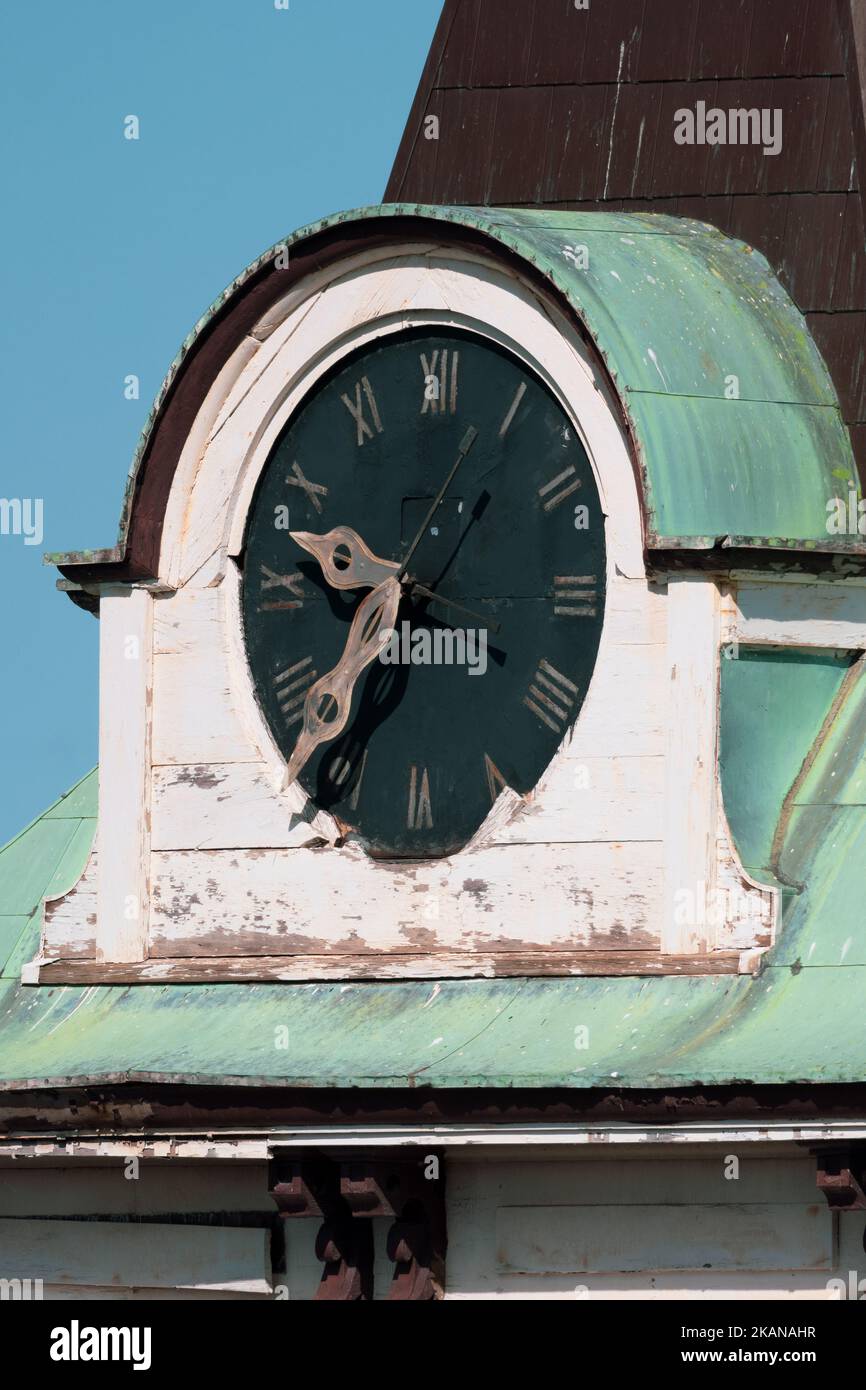 An old blue clock on a church tower in Madison, Wisconsin Stock Photo ...