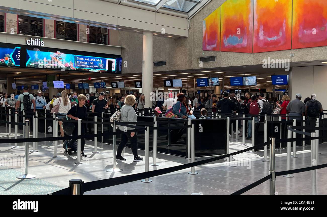 The passengers on TSA Security Checkpoint line at Orlando International ...