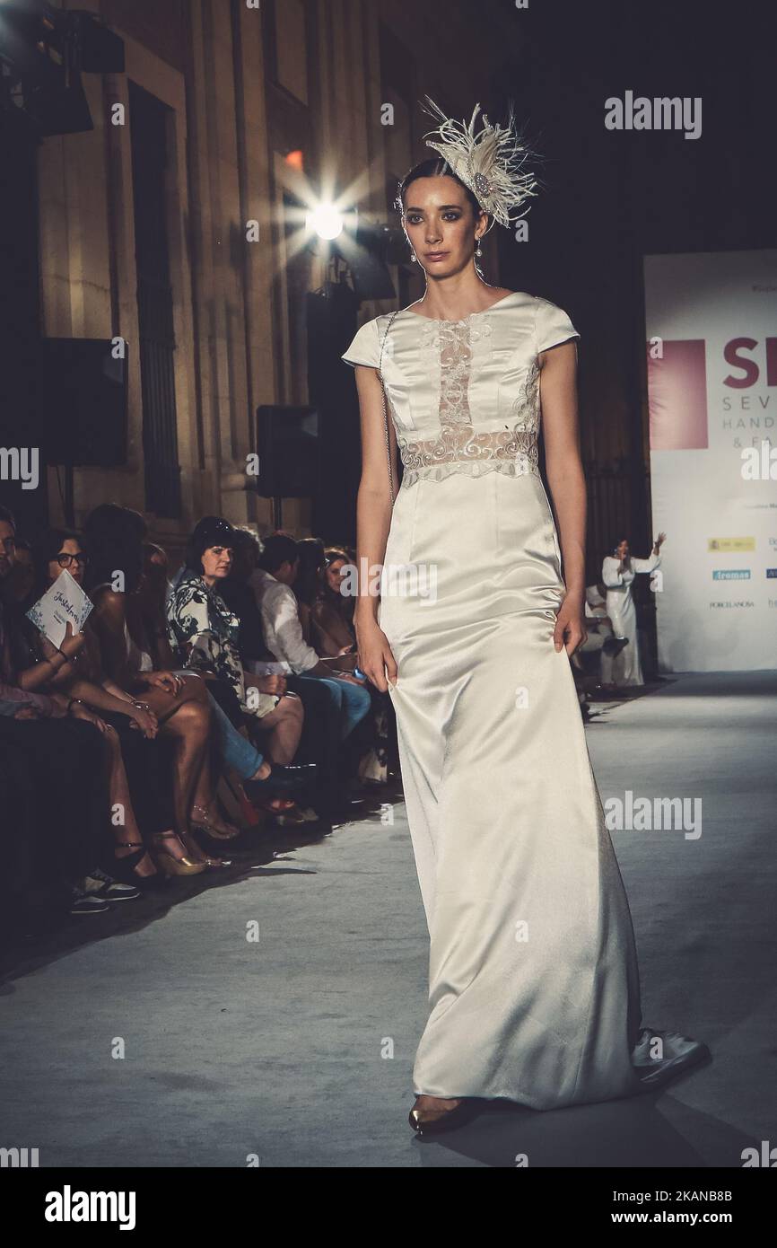 Model of Maria Jose Sarez walks on the catwalk in Seville on May 26 ...