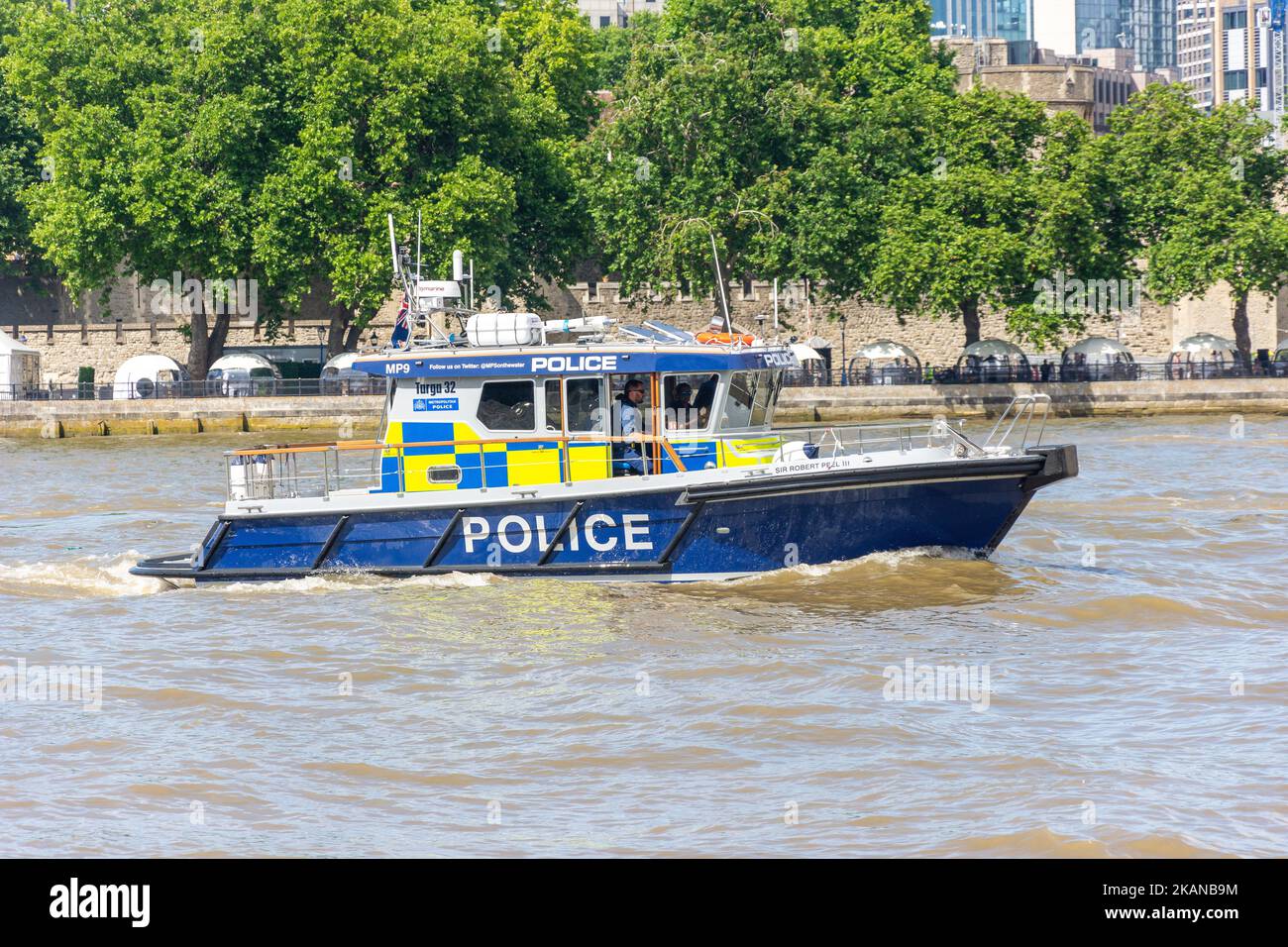 Metropolitan Police launch on River Thames from The Queen's Walk ...