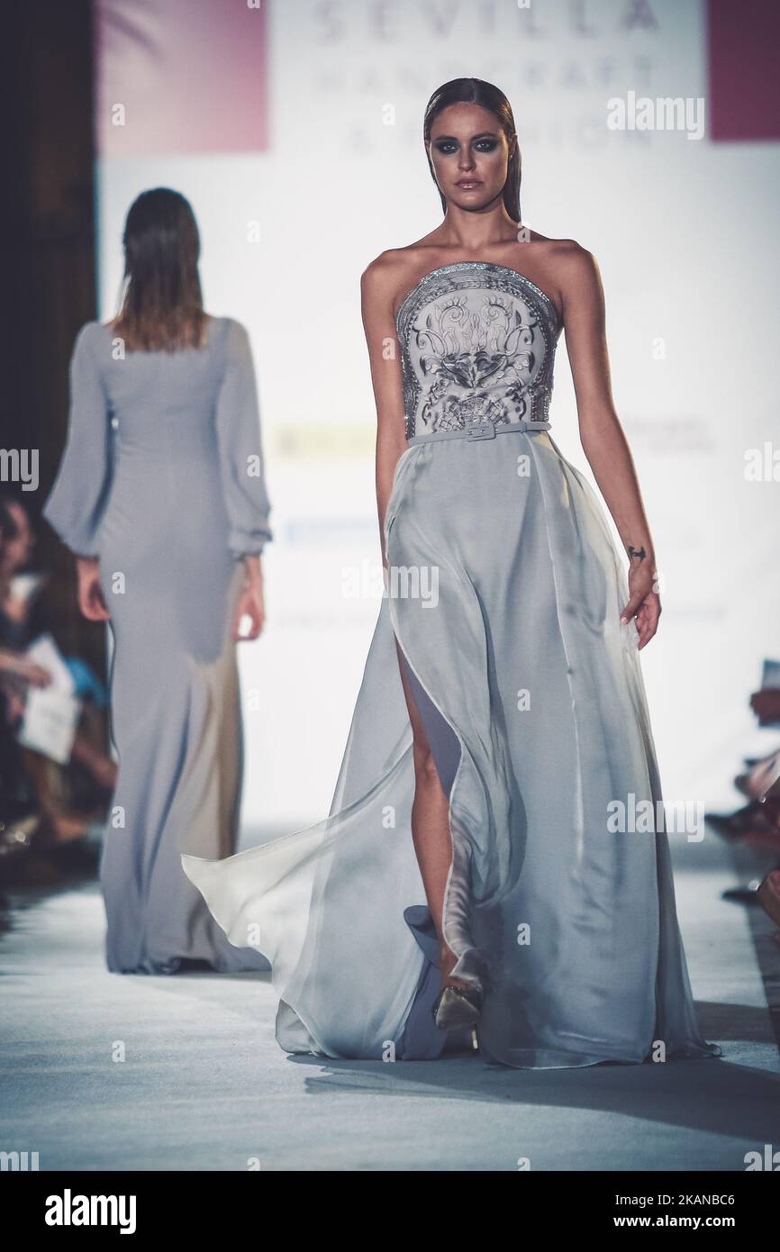 Model of Maria Jose Sarez walks on the catwalk in Seville on May 26 ...