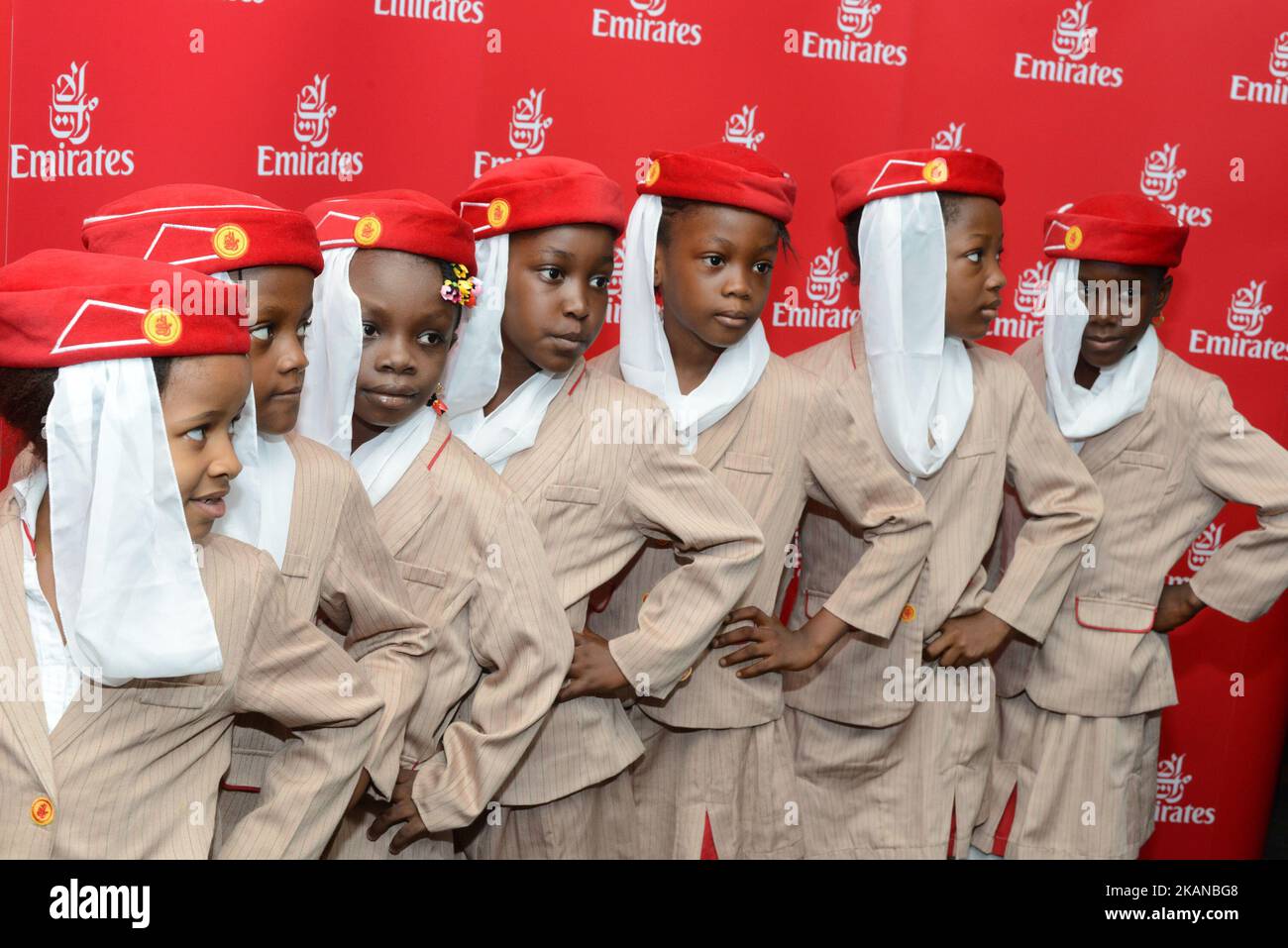Selected school children in cabin crew uniform pose during the Emirates ...