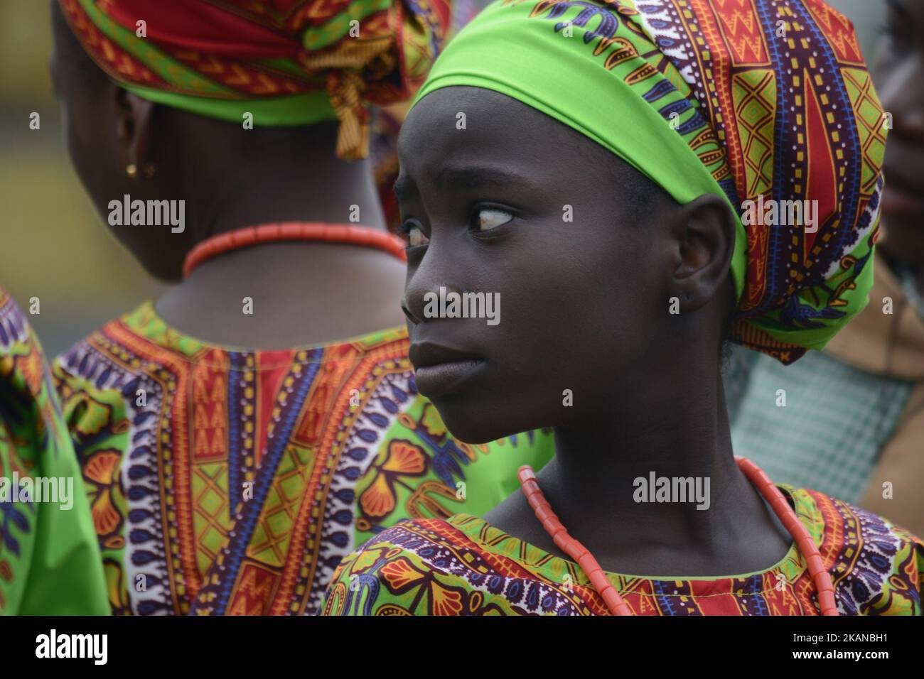 A pupil in native attire looks on during the Childrenâ€™s Day parade at ...