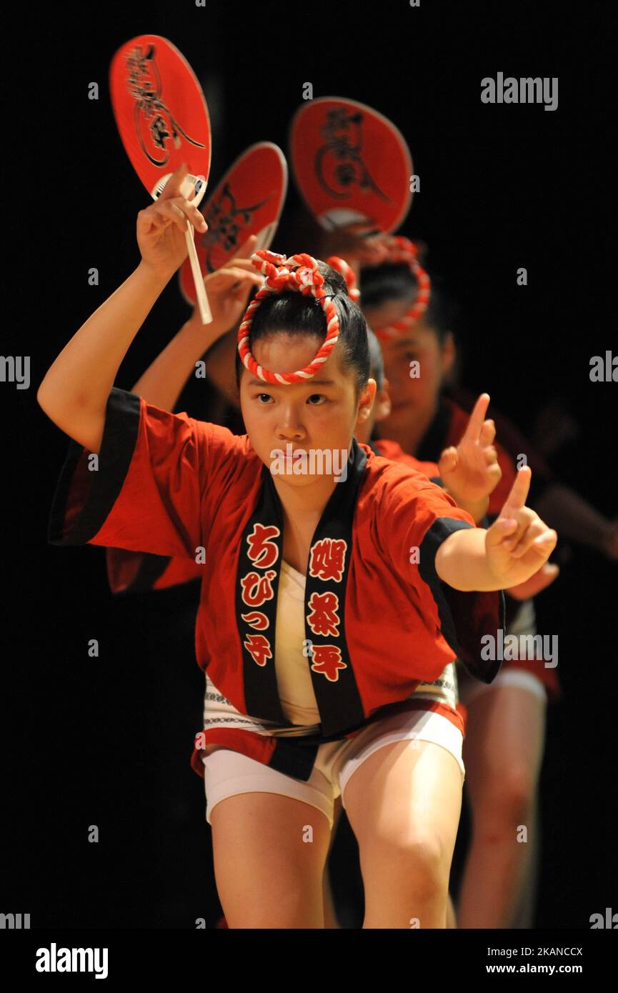 Dancers in colorful costumes perform the traditional Awa Odori folk dance on May 28, 2017 in ...