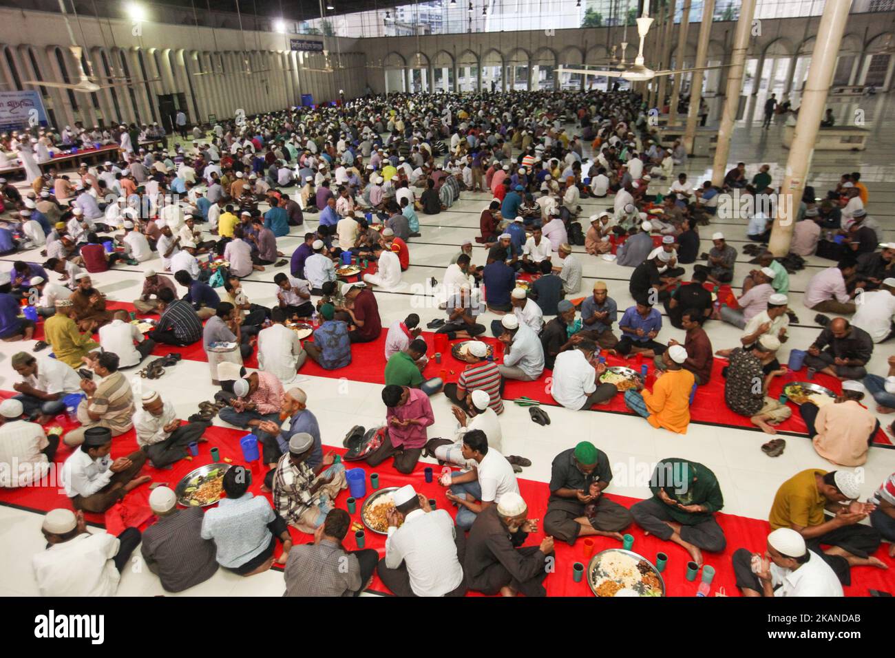 Thousands of Muslims are waiting for the Iftar (Food of Ramadan) in ...