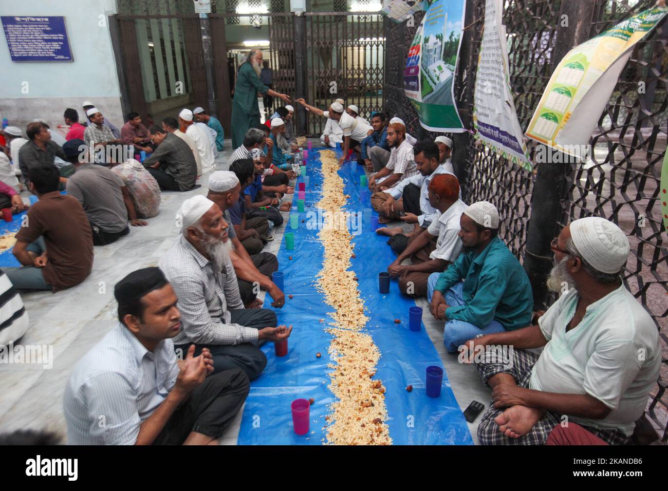 Thousands of Muslims are waiting for the Iftar (Food of Ramadan) in ...