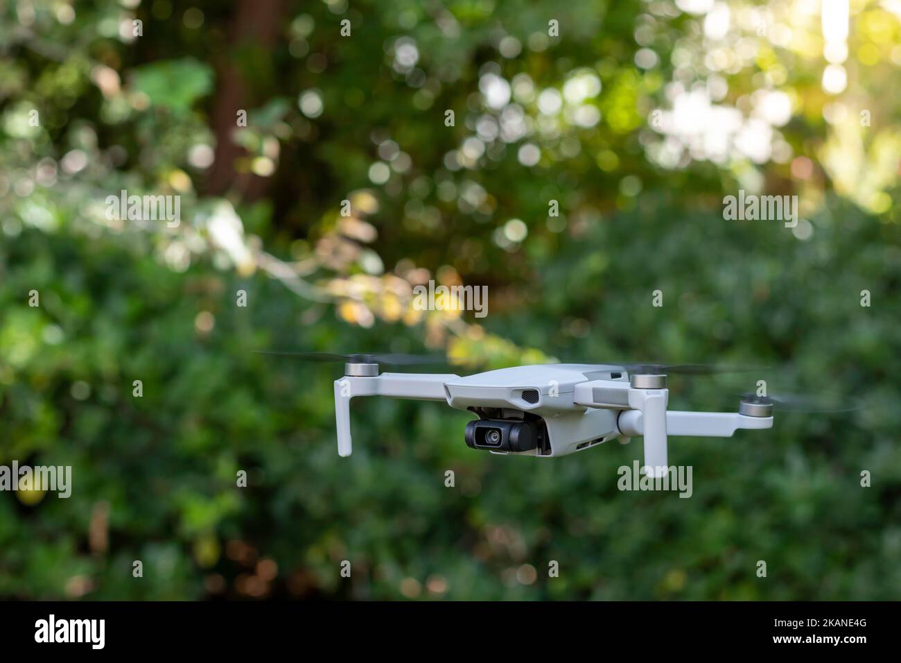 Close up view of small grey drone with camera in the front and copy ...