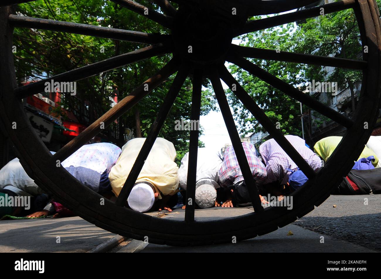 Indian Muslim devotees offer Friday prayers and a hand Rickshaw ...