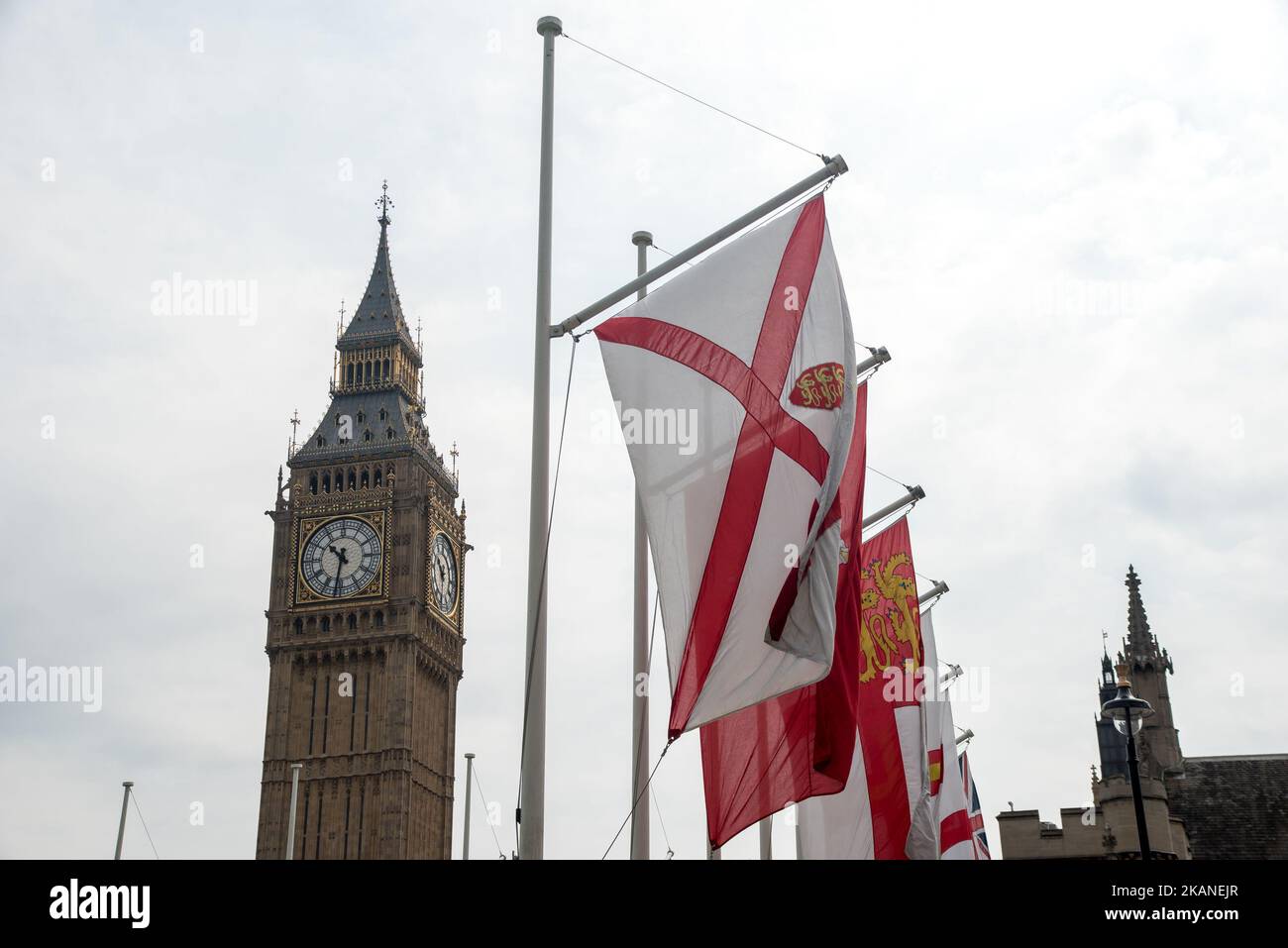 British Dominion flags are seen at Westminster, in Parliament Square ...