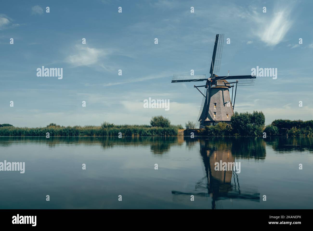 The reflection of one of the Windmills at Kinderdijk, UNESCO heritage ...