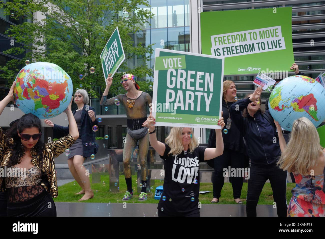 Green Party members stage a dance protest outside the UK Home Office ...