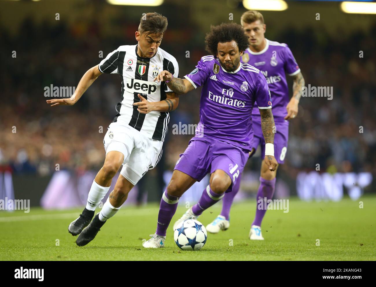L-R Paulo Dybala of Juventus FC and Marcelo of Real Madrid CF during ...