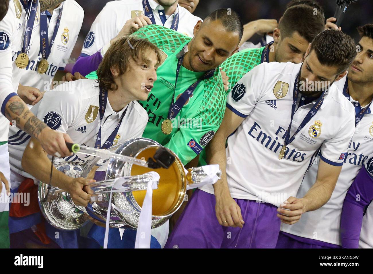 Luka Modric and Keylor Navas of Real Madrid celebrating with the trophy ...